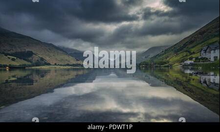 Dramatic rainy weather in Snowdonia. Rain falling on hills and ...