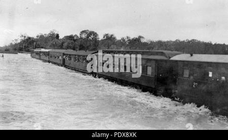 1 83595 Passenger train crossing the old railway bridge over the ...