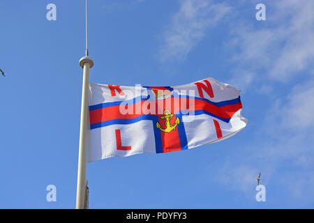 RNLI flag emblem on Lifeboat Stock Photo - Alamy