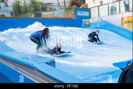 Flowrider surfing in Cornwall Stock Photo - Alamy