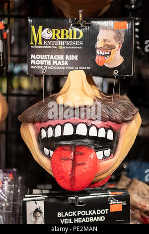 Outrageous unusual half-face masks for sale at a costume store in ...