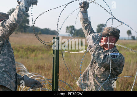 Constructing a picket fence Stock Photo - Alamy