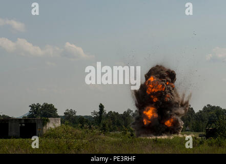 A shape charge explodes on a demolition range event as part of Sapper ...