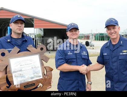 Rear Adm. David R. Callahan, Commander, 8th Coast Guard District (left ...