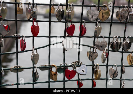 hundreds of "love locks" on the footbridge on river Limmat at Zurich ...