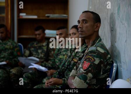 Falintil-Forcas de Defesa de Timor Leste Pvt. Pedro Lopes, right ...
