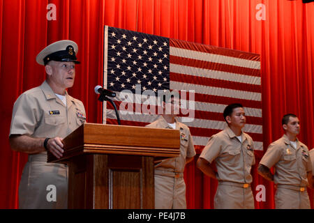 Command Master Chief Joseph Fahrney, left, gives Royal Australian Navy ...
