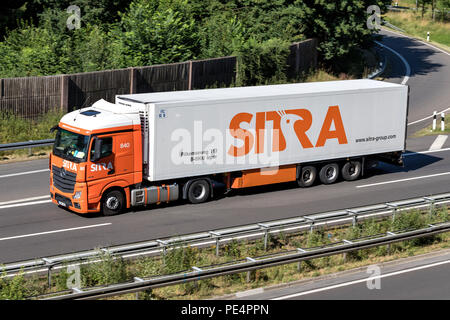 Truck with refrigerated semi-trailer to transport perishable products ...