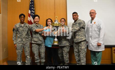 BAMC Commander Col. Evan Renz and Command Sgt. Maj. Tabitha Gavia ...