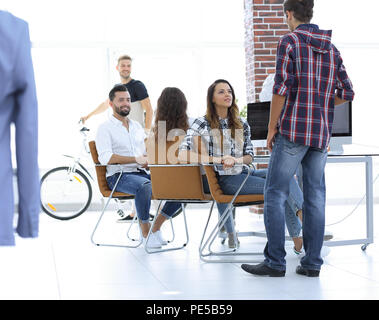 employees of modeling agencies on the workplace Stock Photo - Alamy