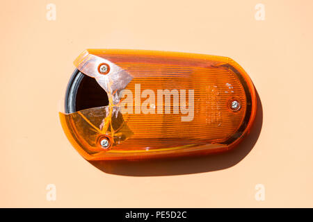 Broken orange side indicator light Stock Photo - Alamy