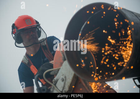 The crew of the Coast Guard Cutter Sledge, a 75-foot River Buoy Tender ...