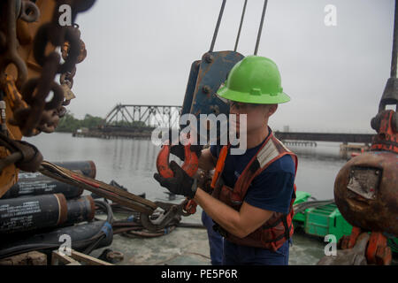 The crew of the Coast Guard Cutter Sledge, a 75-foot River Buoy Tender ...