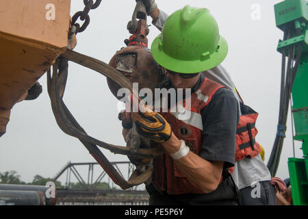 The crew of the Coast Guard Cutter Sledge, a 75-foot River Buoy Tender ...