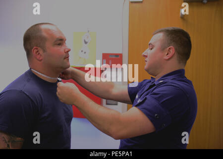 Yeomen Petty Officer 1st Class (YN1) Christine Quinn (left photo) and ...