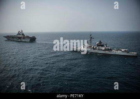 The French navy frigate FS Cassard passes alongside the aircraft Stock ...