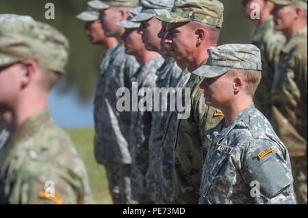 U.S. Army Maj. Lisa Jaster is congratulated by Capt. Kristen Griest ...