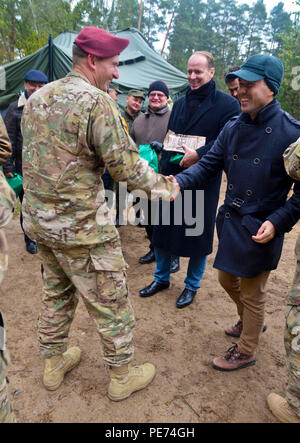 U.S. Army Col. Michael Kloepper, left, commander of 173rd Airborne ...