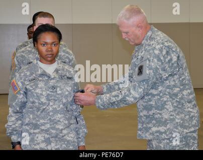 A representative with the 218th Maneuver Enhancement Brigade officially ...