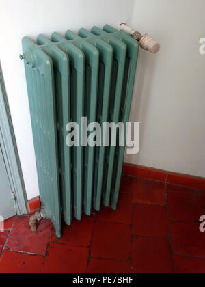 French Vintage cast iron radiator Stock Photo - Alamy