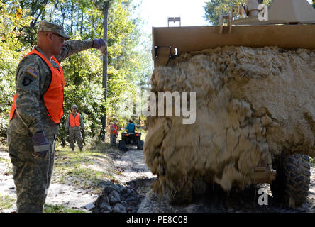 U.S. Army Sgt. Travis Maroney and Staff Sgt. Andrew Brazell, assigned ...