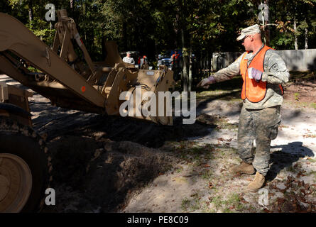 U.S. Army Sgt. Travis Maroney and Staff Sgt. Andrew Brazell, assigned ...