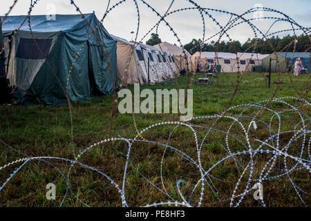 Marines set up the tents for the combat operations center for Stock ...