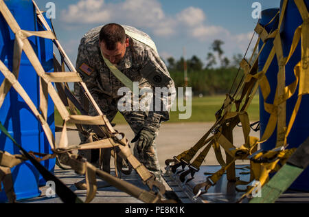 Army trucks with the Load Handling System Compatible Water Tank Rack ...