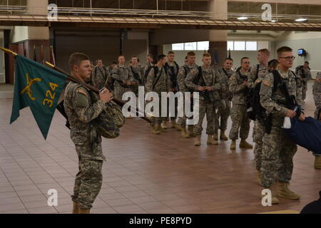 Soldiers assigned to the 324th Military Police Battalion deplane the ...