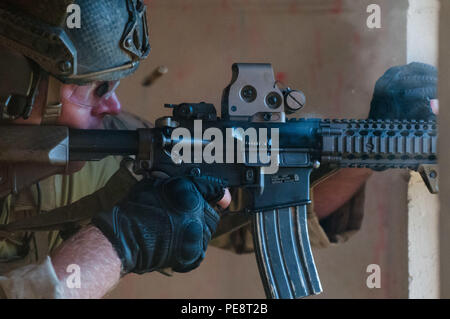 Special forces soldier inside building aim target rifle Stock Photo - Alamy