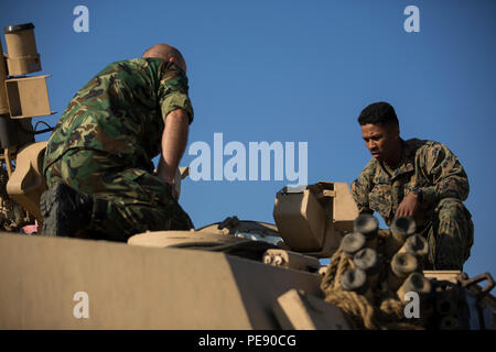 The photo shows a M1A1 Abrams tank with M1A2 Sep V2 Abrams reactive ...