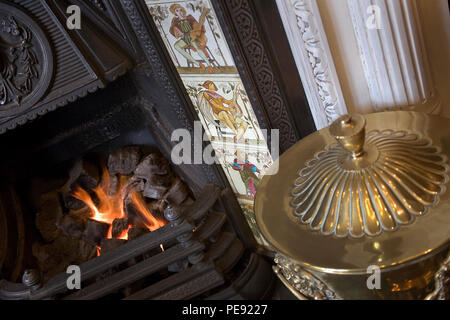Victorian fireplace with decorative tiles and open fire Stock Photo - Alamy