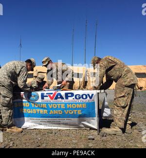 Voting Assistance Officer 1st Lt. Chase Cappo (middle back), assigned ...