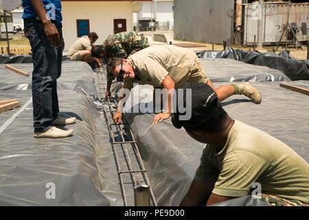 Falintil-Forcas de Defesa de Timor Leste Pvt. Pedro Lopes, right ...