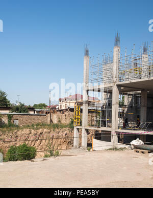 The frame of a high-rise building under construction. Reinforced ...