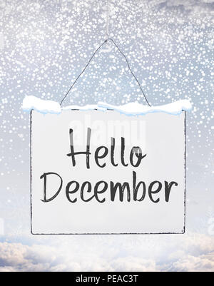 hello december, winter and christmas decor card Stock Photo - Alamy