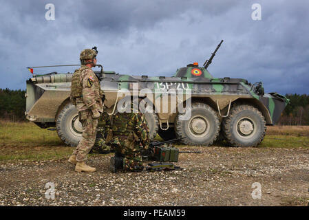 U.S. Army Col. Phil Brooks, center, of 1st Armored Brigade, 3rd ...