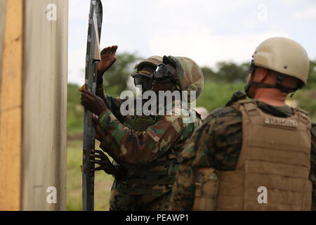 Marines prepare an oval charge for use during urban breaching Stock ...
