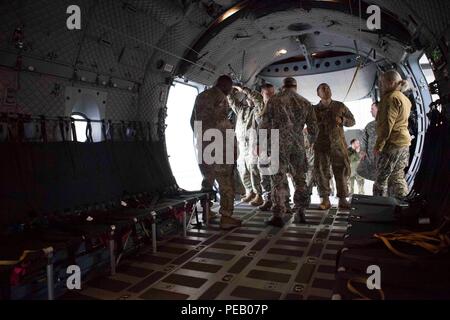 Latvian jumpmasters conduct aircraft familiarization training at ...