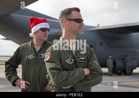 Lt. Col. John Marks, left, a pilot with the 303rd Fighter Squadron ...
