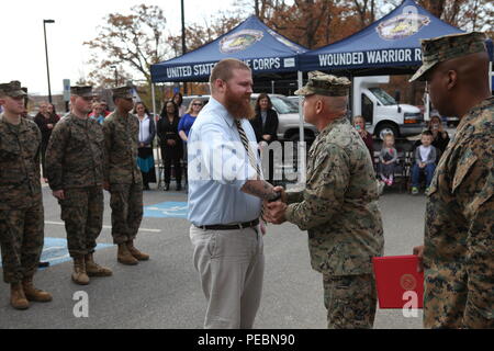U.S. Marine Corps Col. Brandon W. Graham (left), the commanding officer ...