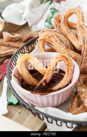 Yummy deep fried churros with cinnamon and sugar Stock Photo - Alamy