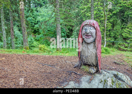 Norwegian carved wooden troll. Scandinavian folklore. Norway. Vertical ...