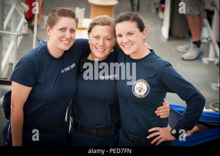 U.S. Coast Guard plank owners stand at parade rest during during the ...