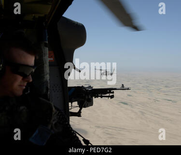 An adviser from NATO Resolute Support unit, Task Force Forge, shows an ...