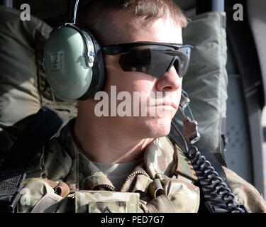 An adviser from NATO Resolute Support unit, Task Force Forge, shows an ...