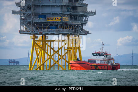The substation and turbines on Walney Offshore Wind Farm off the ...