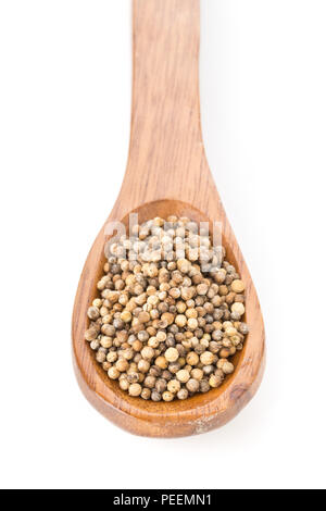 Coriander seeds heap on the wood background Stock Photo - Alamy