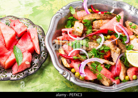 Summer salad with beef steak, watermelon and spices.Exotic food Stock ...