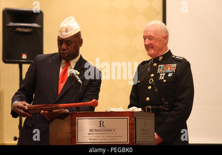 Lt. Gen. Richard Mills presents a Certificate of Status and ...